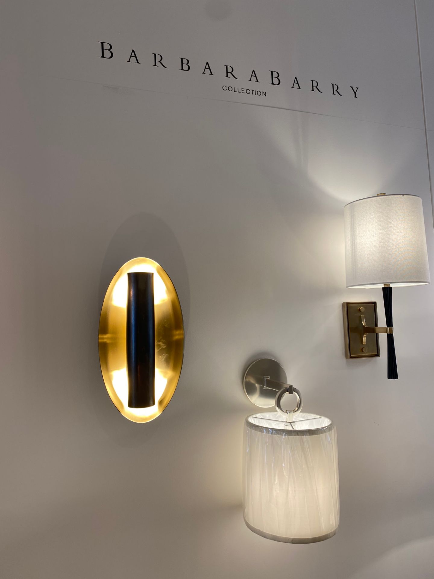 Aura Medium Oval Sconce in Bronze with Soft Brass Interior - Lumiere